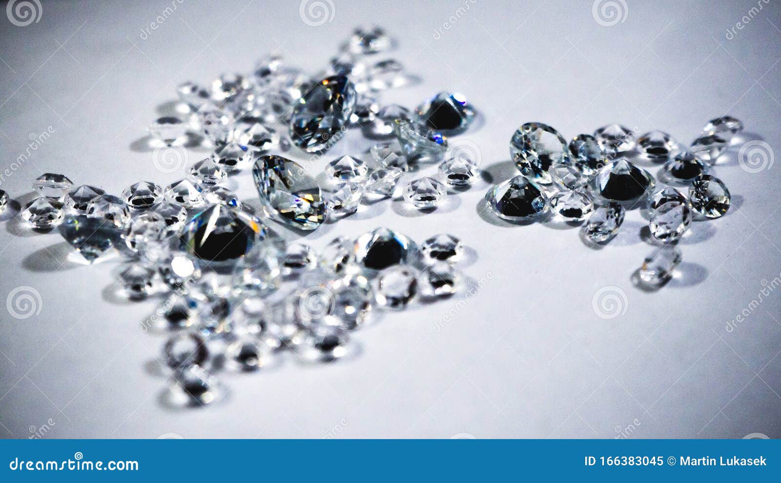 Shiny Diamonds Stones Laying on White Table Stock Image - Image of ...