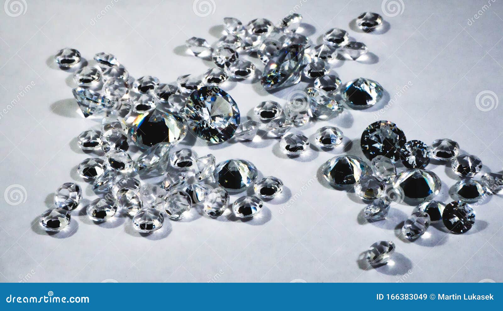 Shiny Diamonds Stones Laying on White Table Stock Image - Image of ...