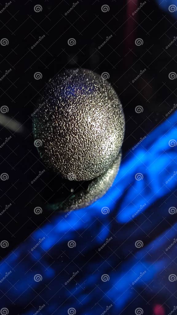 Shiny Ear Rings on a Reflective Surface Stock Image - Image of jewel ...