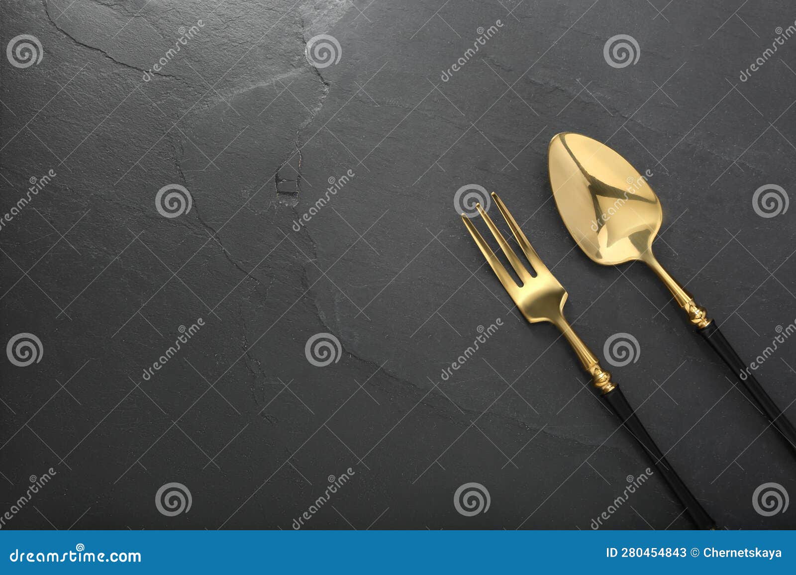 Shiny Fork and Spoon on Table, Flat Lay. Space for Text Stock Image ...