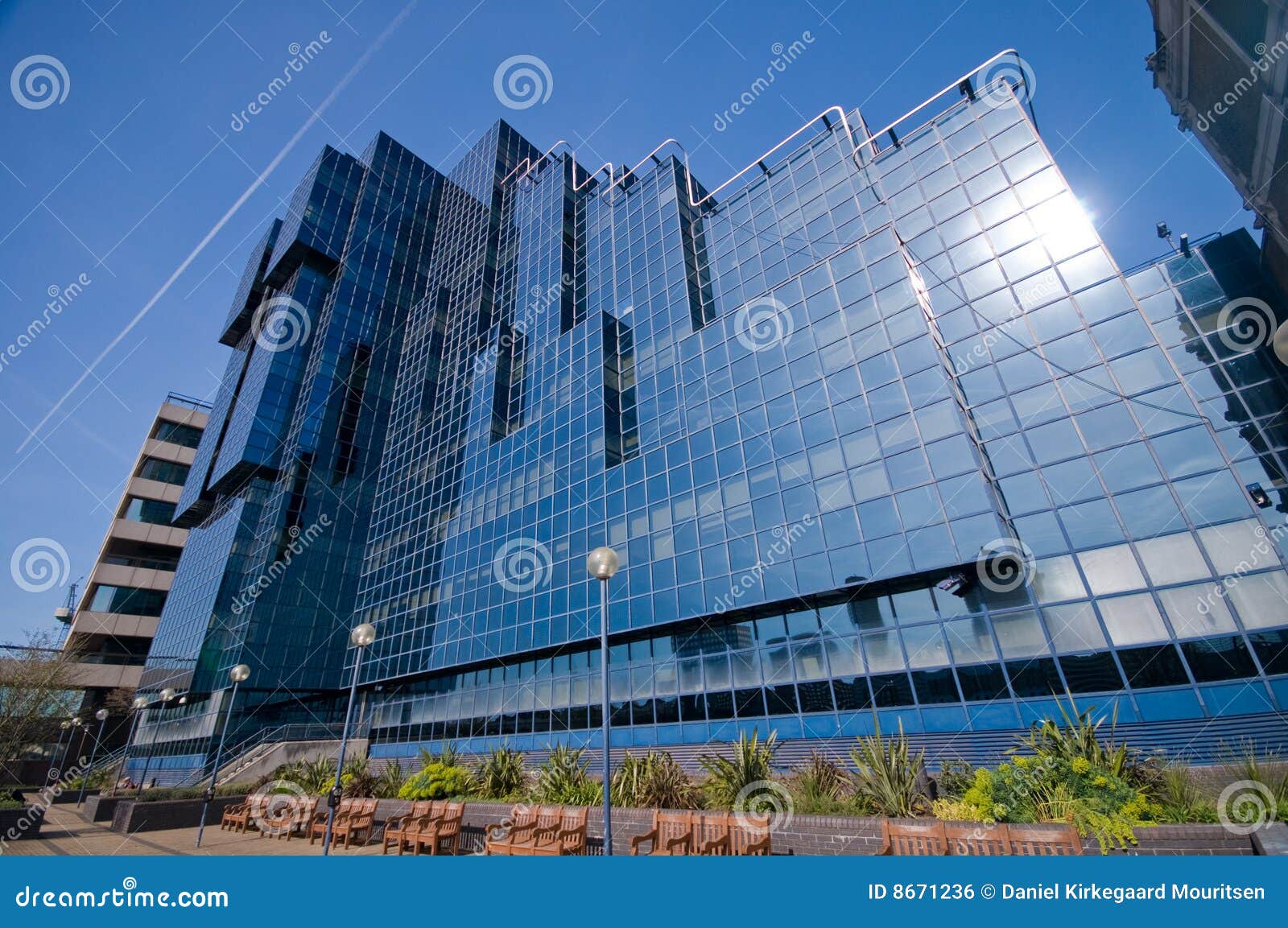 Shiny Glass Office Building Against Blue Sky Stock Photo - Image of ...