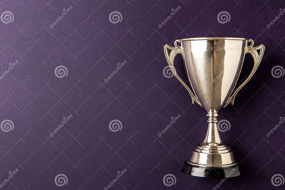 A Shiny Gold Trophy on a Purple Background. Stock Illustration ...