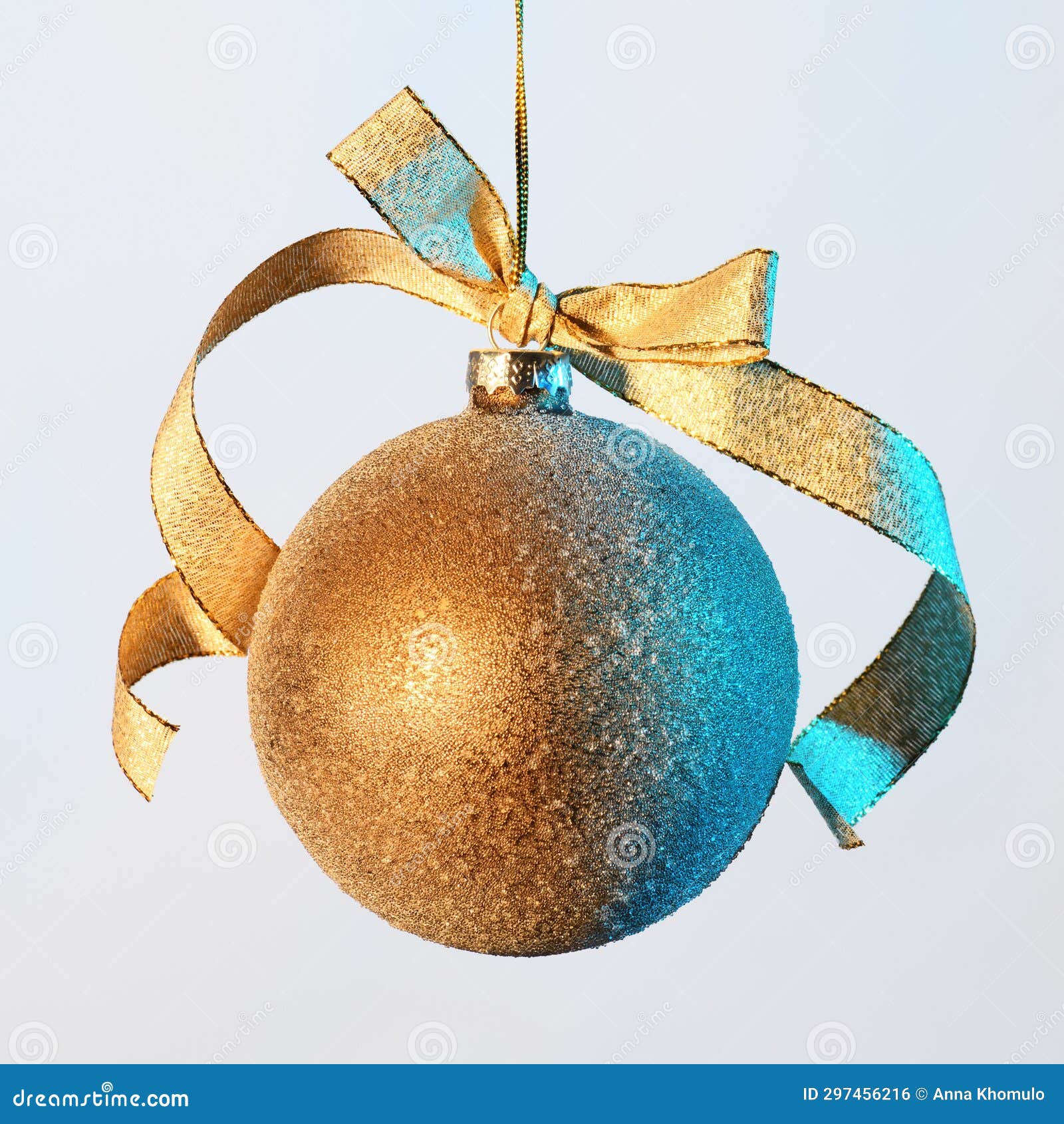 Shiny golden bauble stock photo. Image of blue, color - 297456216
