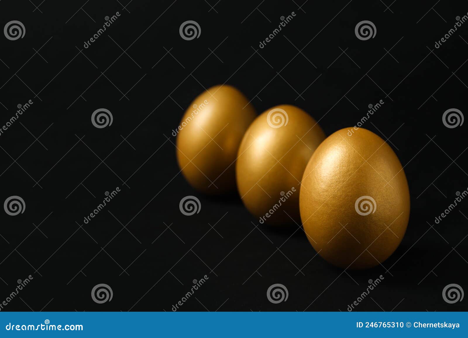 Shiny Golden Eggs on Black Background, Space for Text Stock Photo ...
