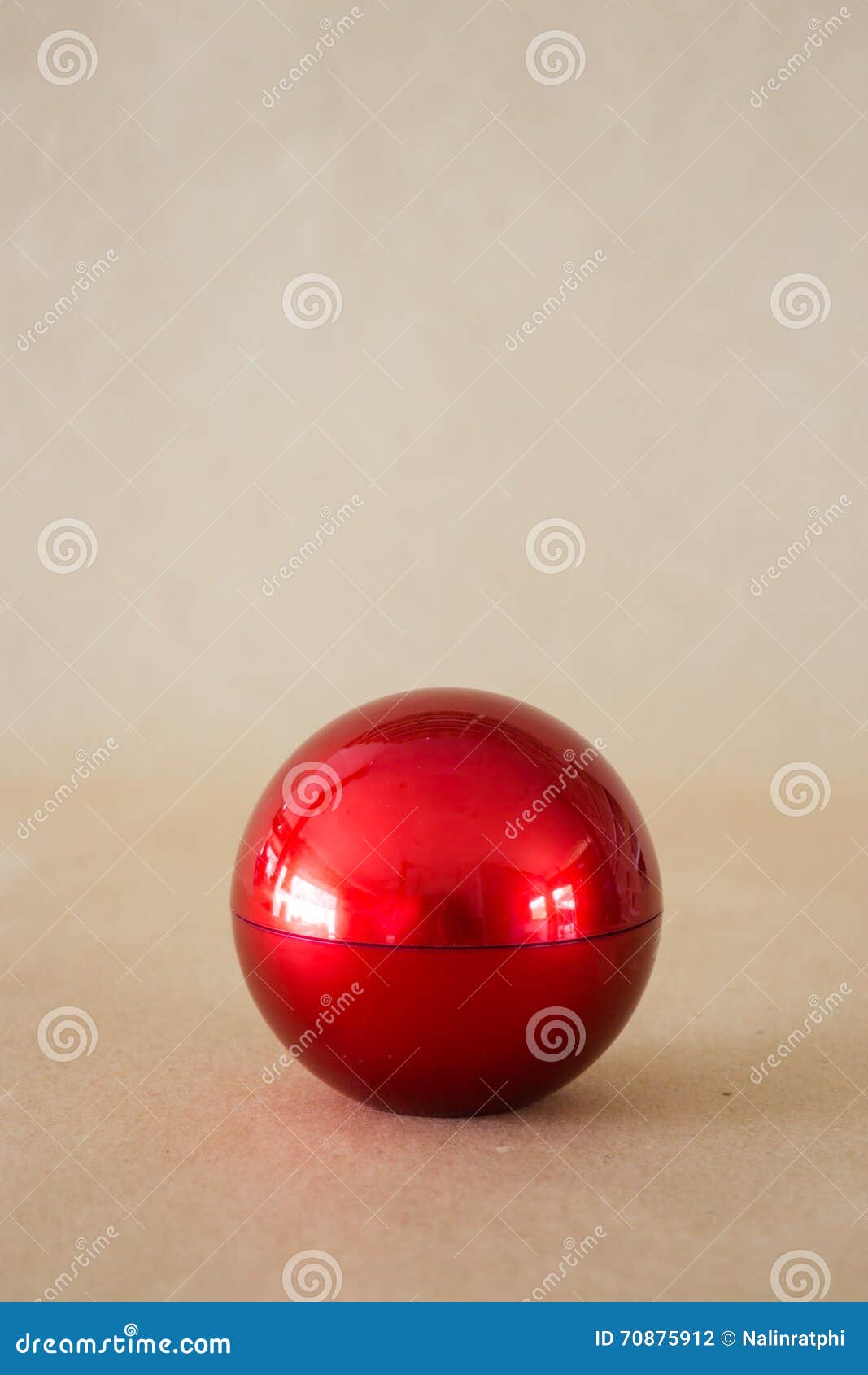 Shiny Hard Red Ball on Brown Background Stock Photo - Image of light ...