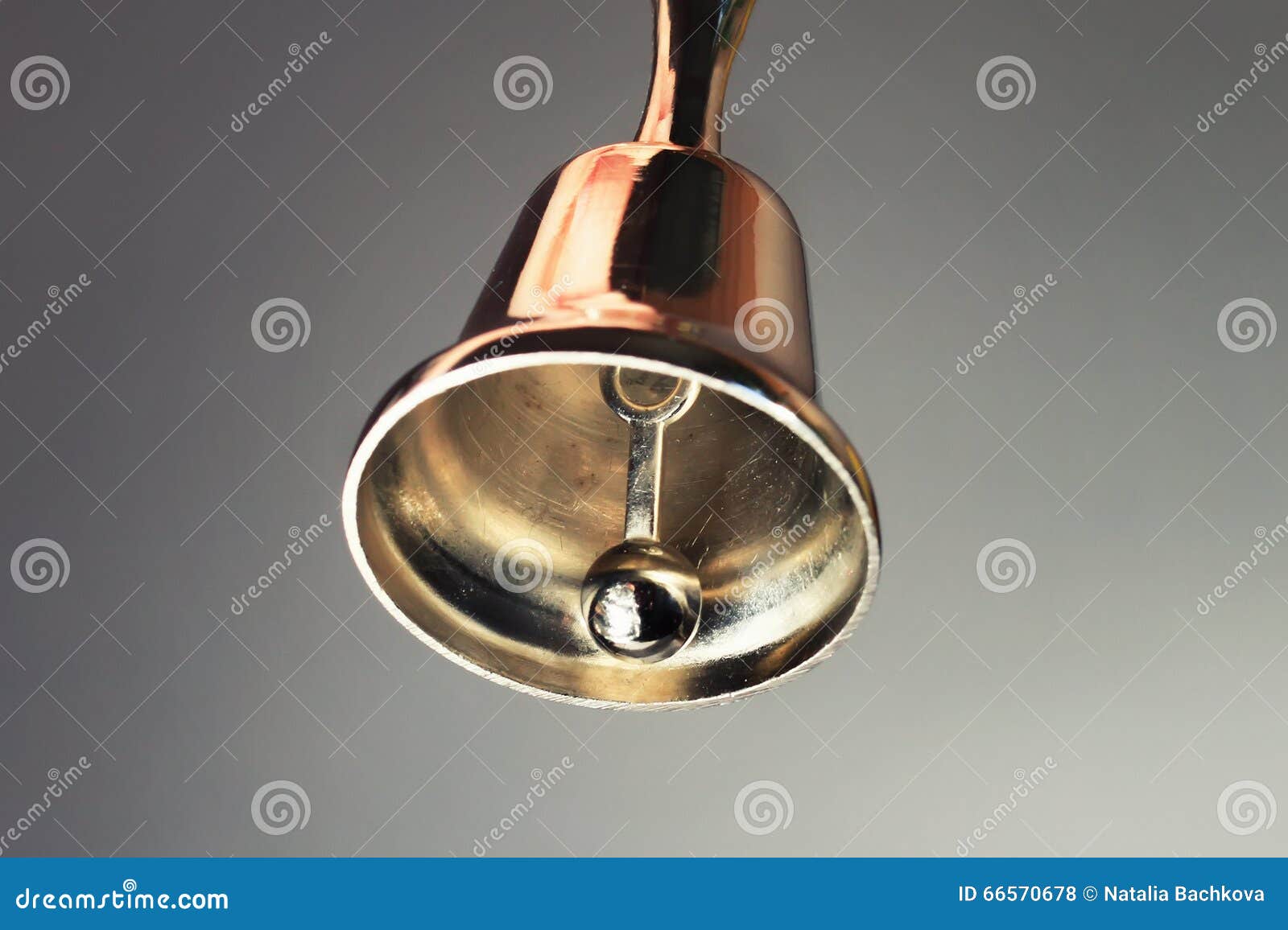 Shiny metal bell ringing stock photo. Image of rays, shine - 66570678