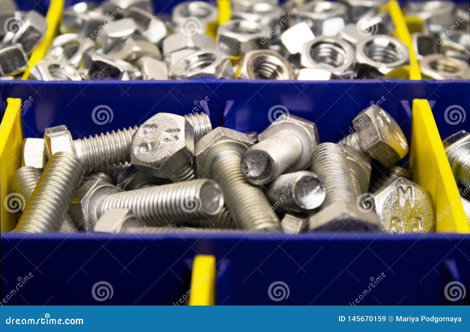 Shiny New Bolts and Nuts in Containers, Close-up Stock Image - Image of ...