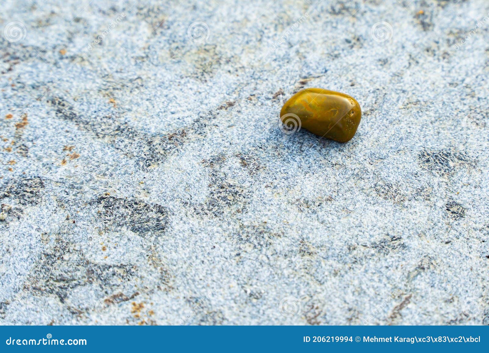 Shiny Rock on Textured Concrete Surface Stock Photo - Image of abstract ...