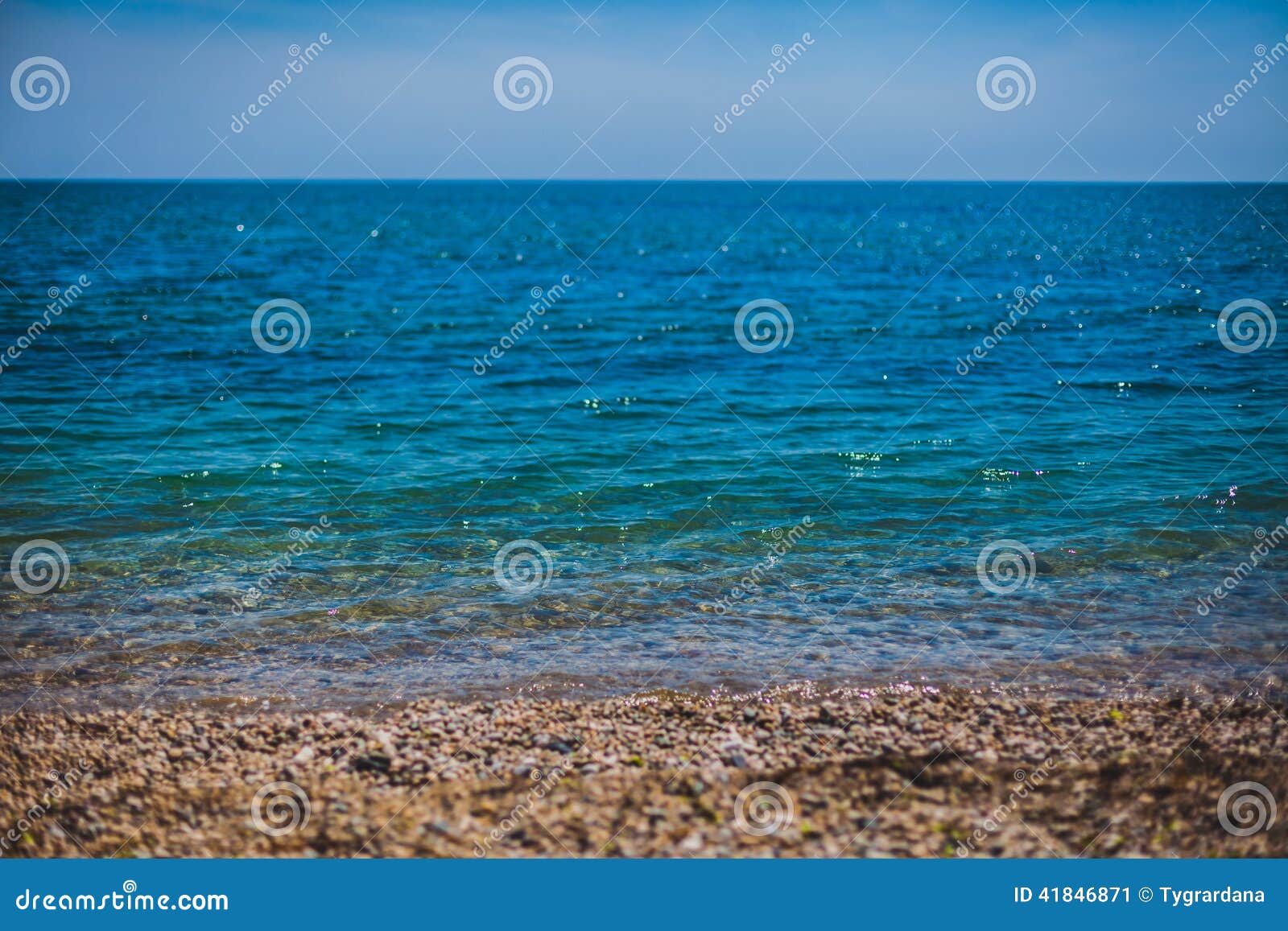 Shiny Sea Coast with Shingle Stock Image - Image of outdoors, blue ...