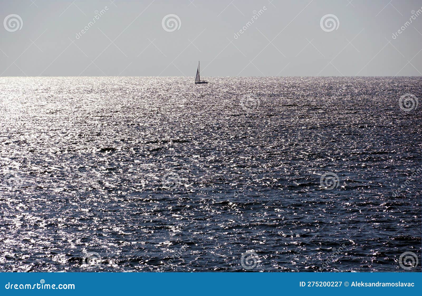 Shiny Sea Horizon with Sailing Yacht and Silver Shining Waves Stock ...