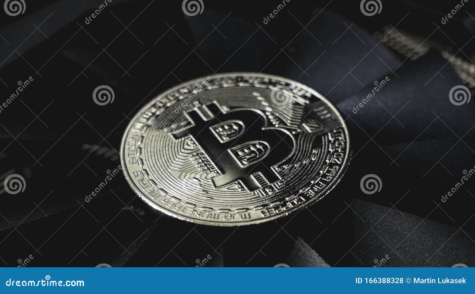 Shiny Silver Bitcoin Coin Crypto Currency Laying in Gpu Graphic Card ... Shiny Silver Bitcoin Coin Crypto Currency Laying in Gpu Graphic Card ...
