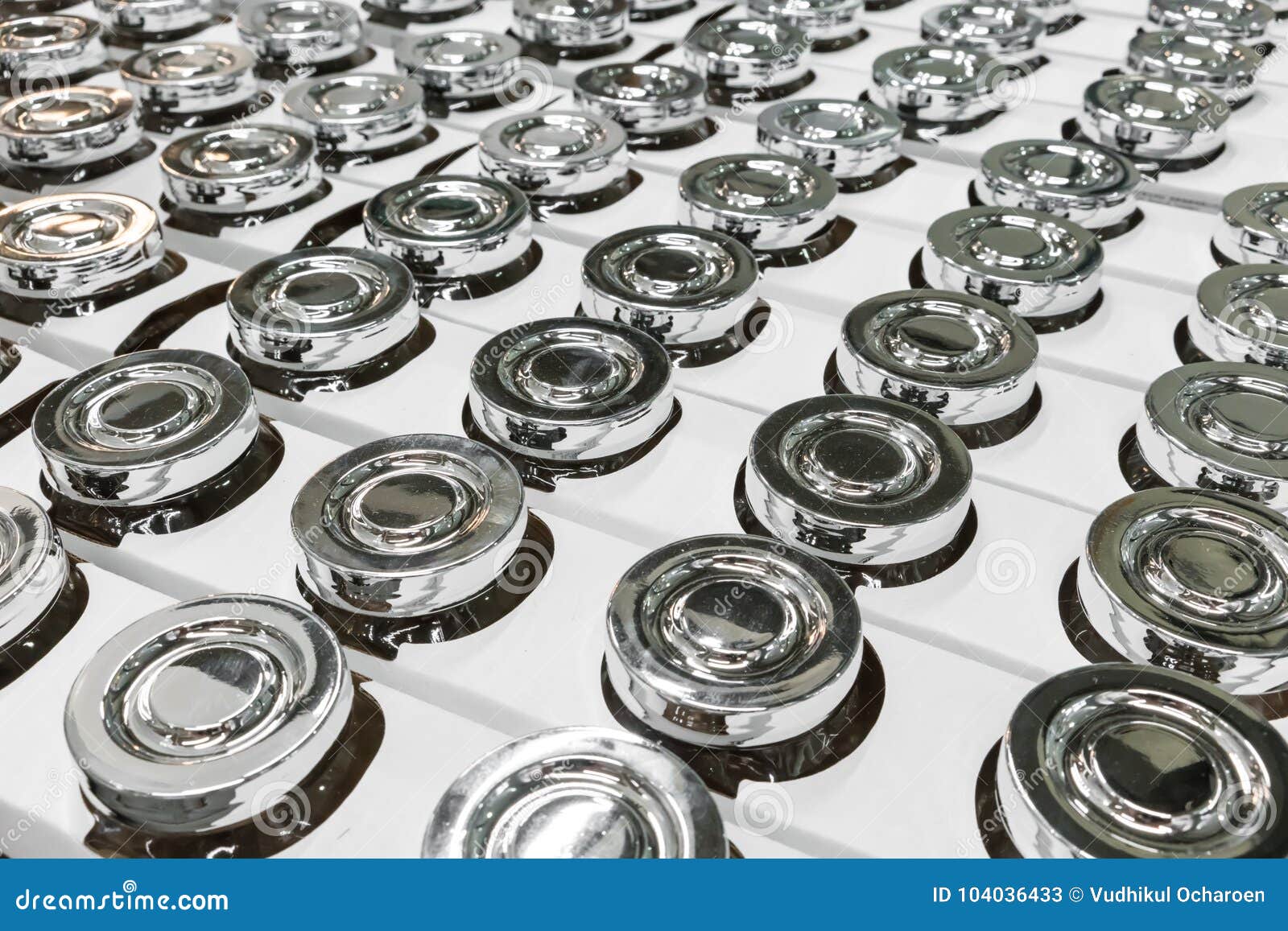Shiny Silver Round Caps of Clear Glass Jar in Rows for Pattern B Stock ...