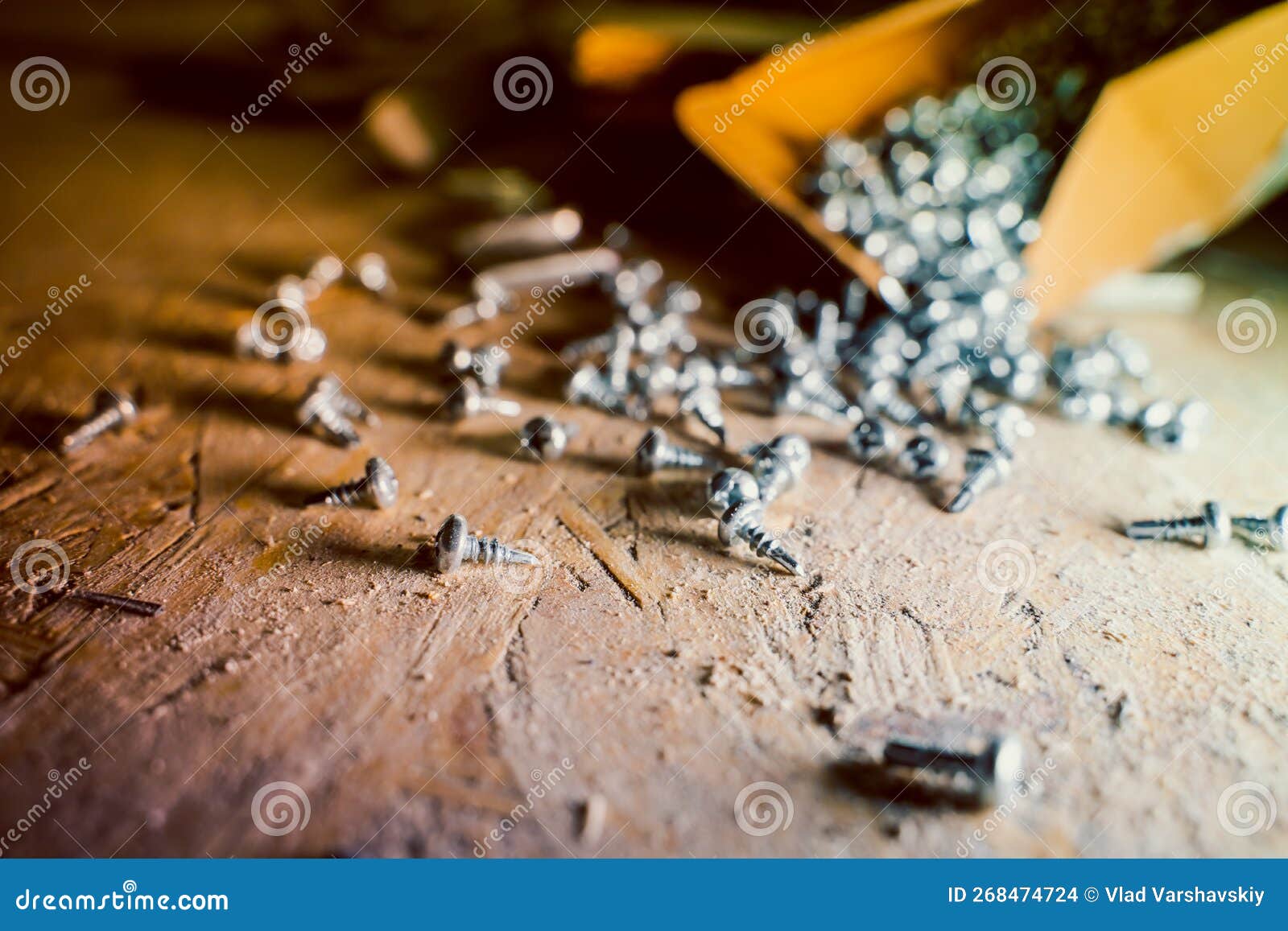 Shiny Small Self-tapping Screws Bugs Scattered from the Box on the ...