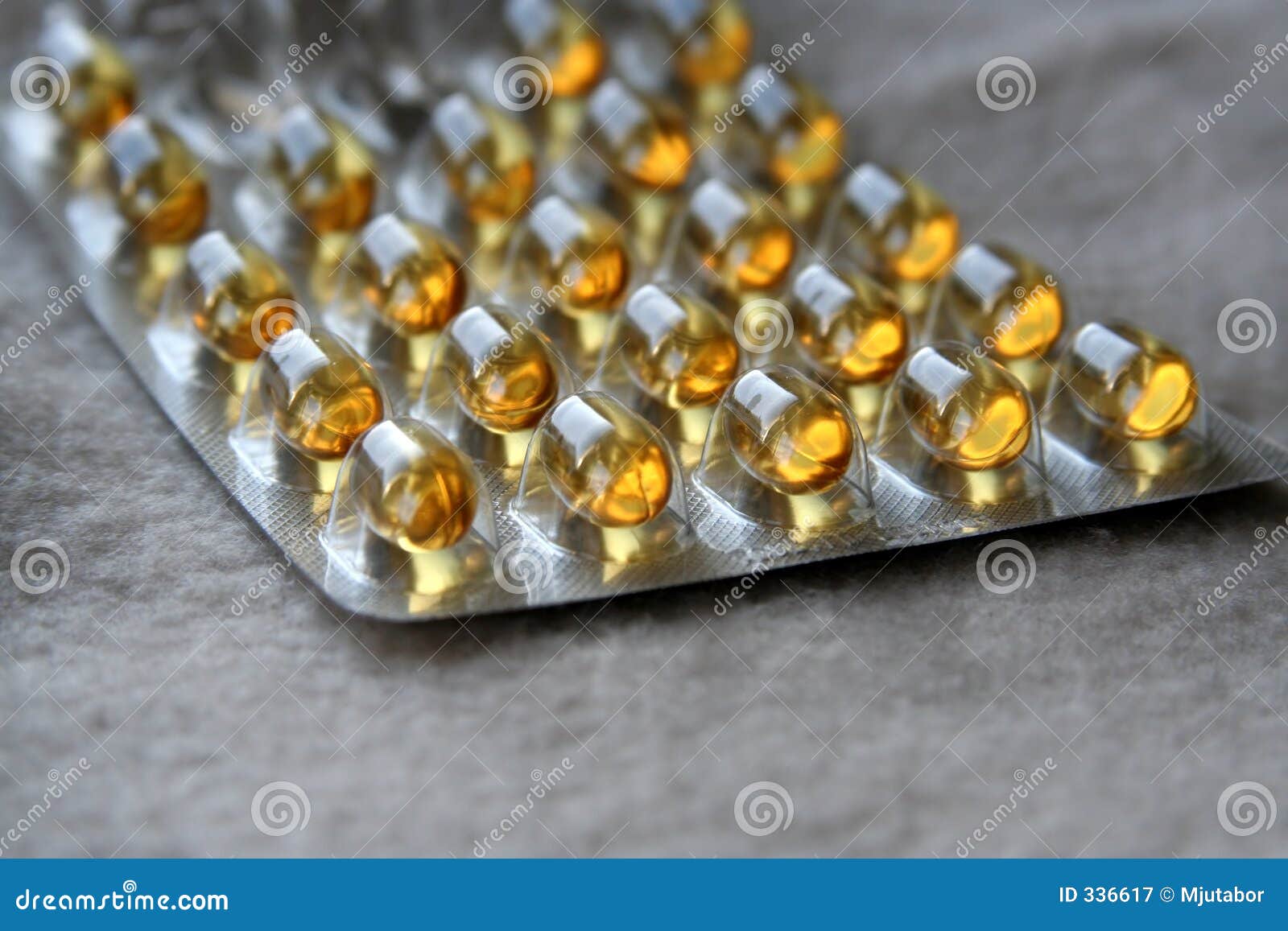 Shiny yellow pills stock image. Image of healing, prescription - 336617