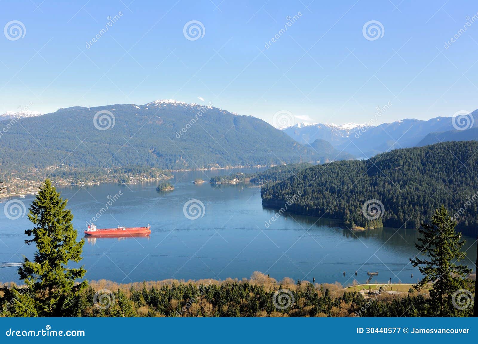 Ship Anchoring in a Sea Inlet Stock Image - Image of blue, island: 30440577