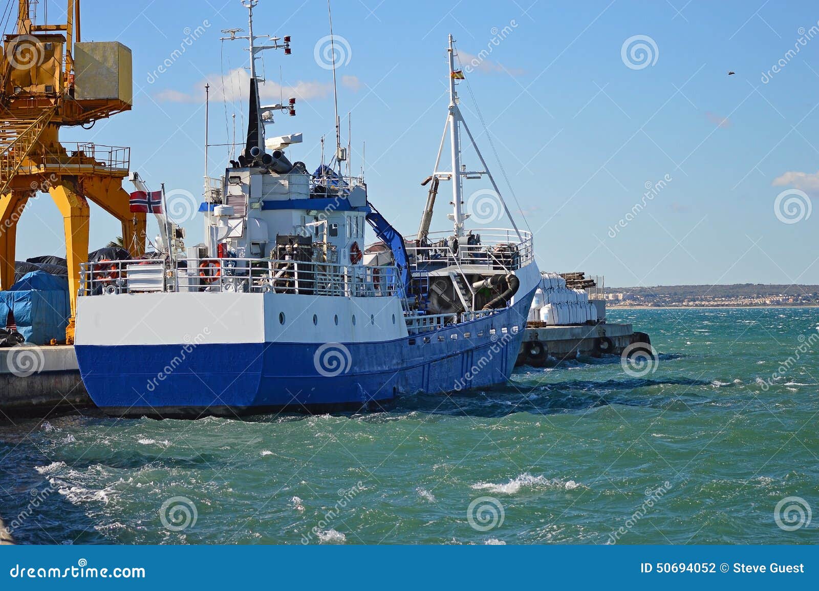 A Ship Being Loaded stock photo. Image of container, business - 50694052