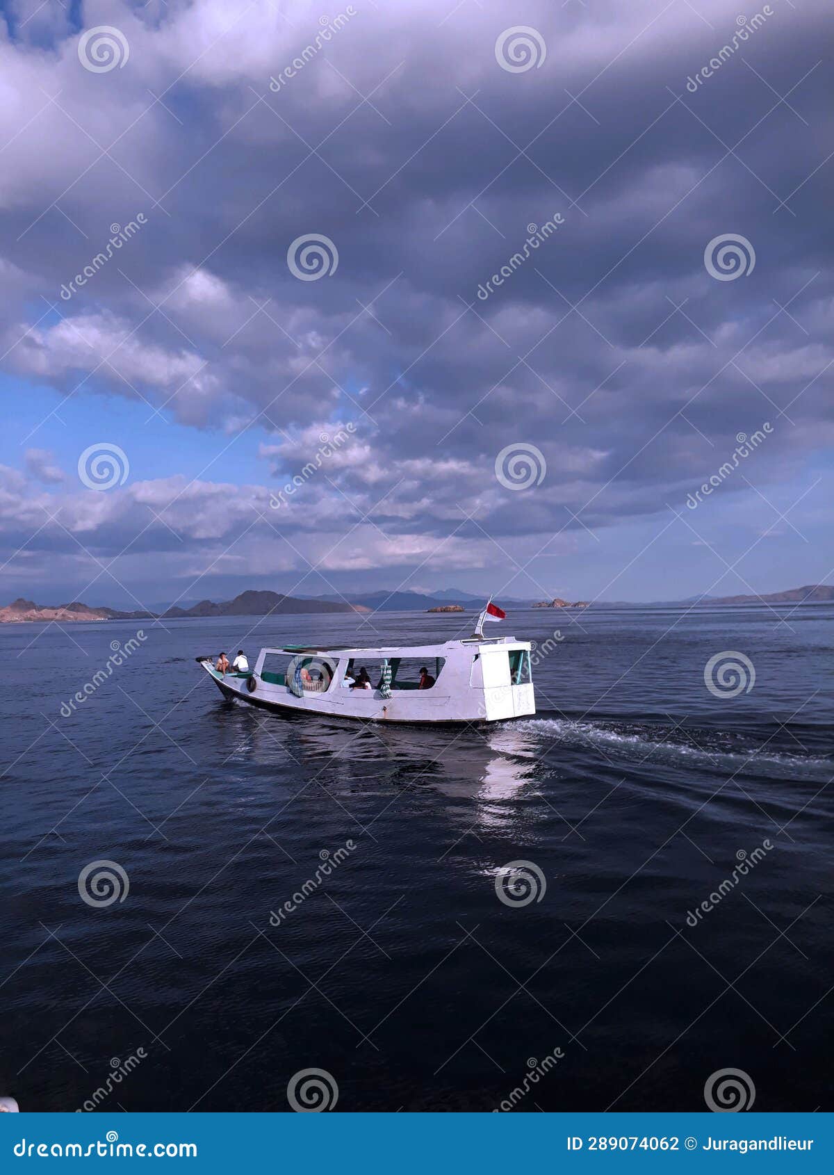 Ship in the blue ocean stock photo. Image of boat, ocean - 289074062