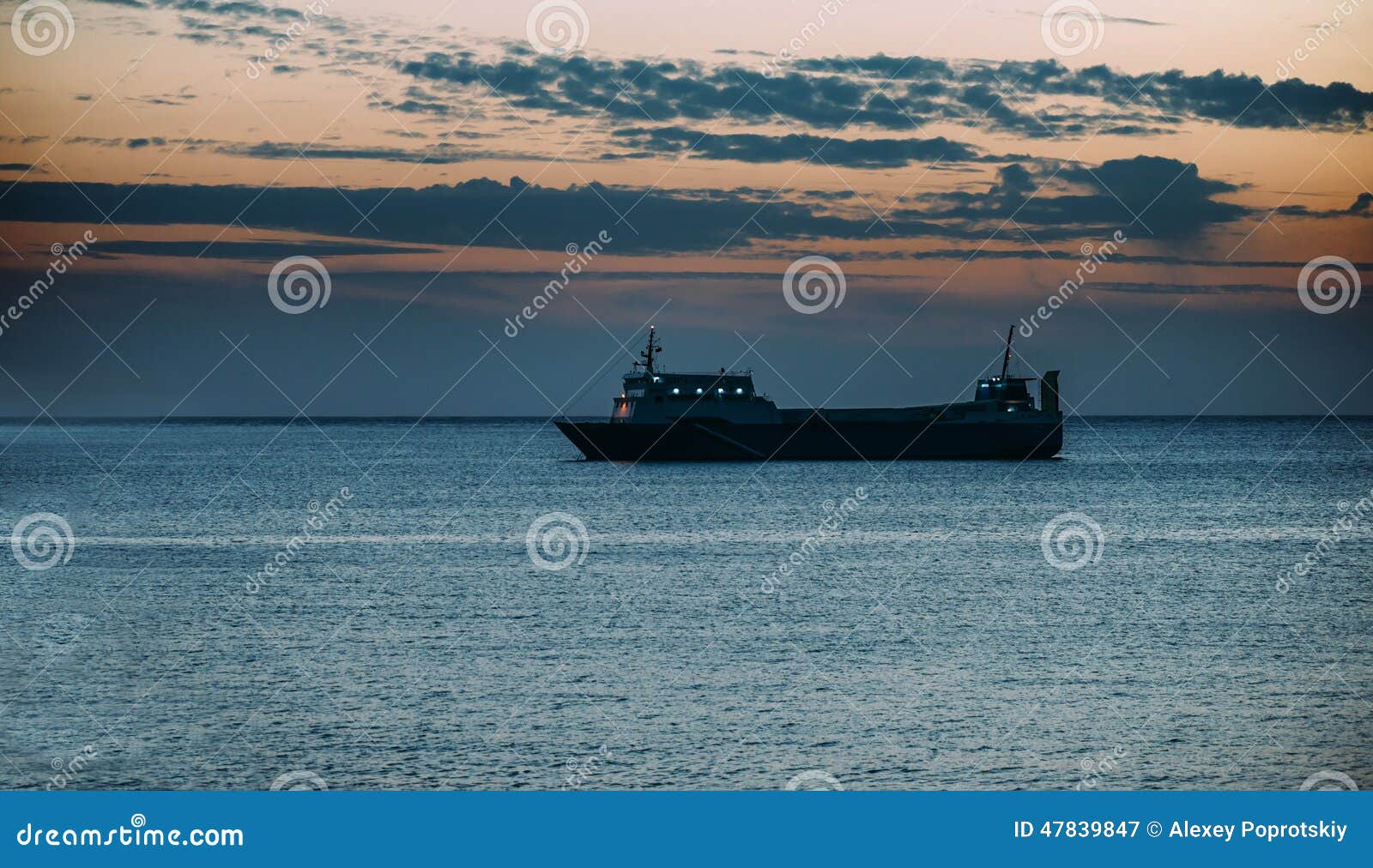 Ship in the Blue Sea at Sunset Stock Image - Image of cloudy, shipping ...