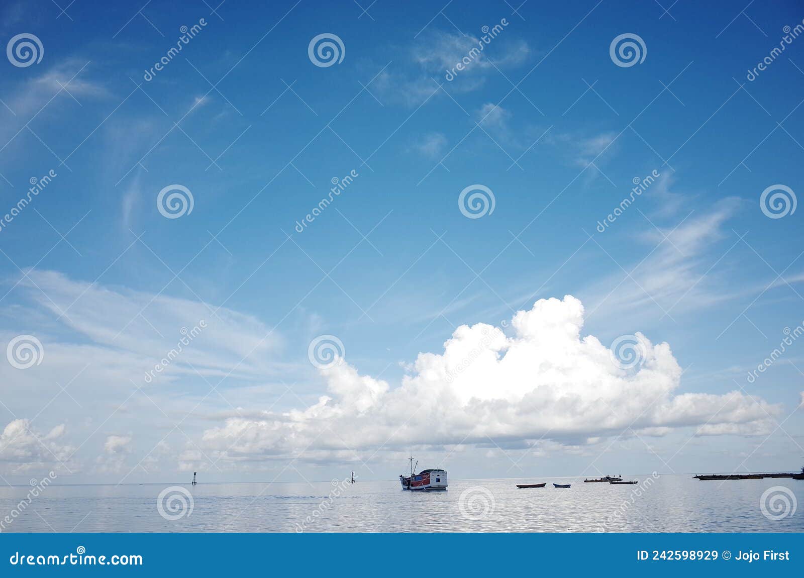 Ship and the blue sky stock image. Image of sunlight - 242598929