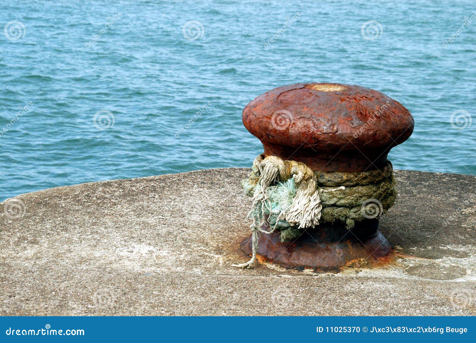 Ship bollard in a habour stock photo. Image of gaelic - 11025370