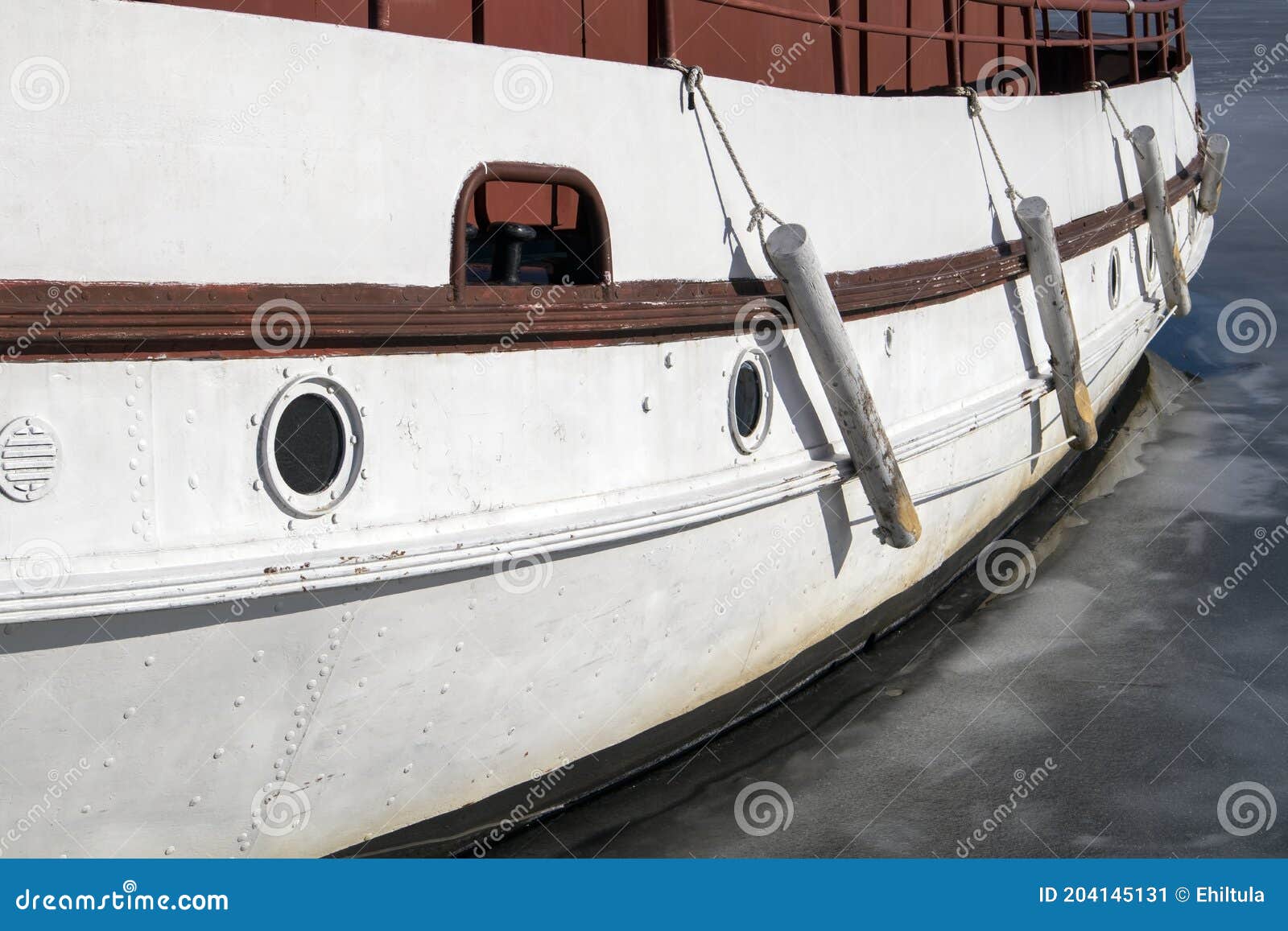 Ship Broadside Frozen in Ice Stock Image - Image of sunny, dock: 204145131