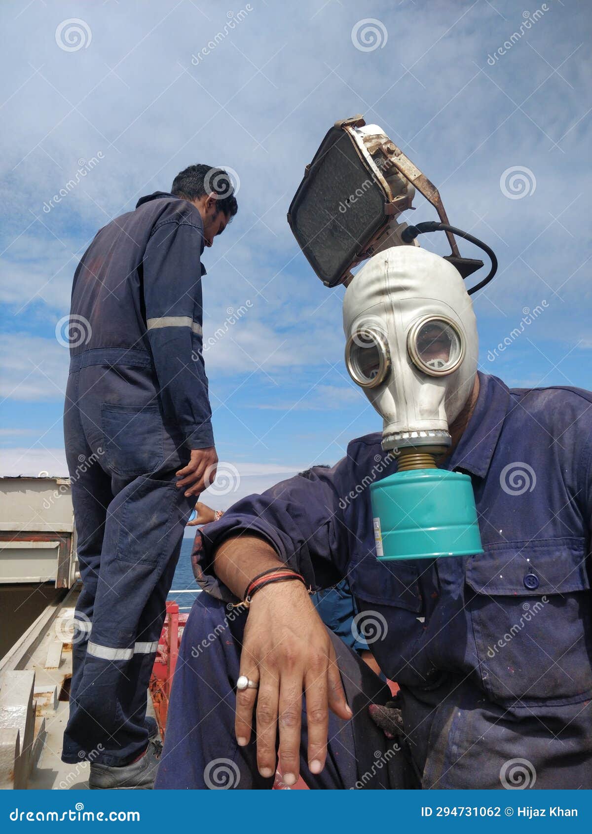 Ship Crew Wearing Oxygen Mask and Preparing for Entering the Hatch for ...