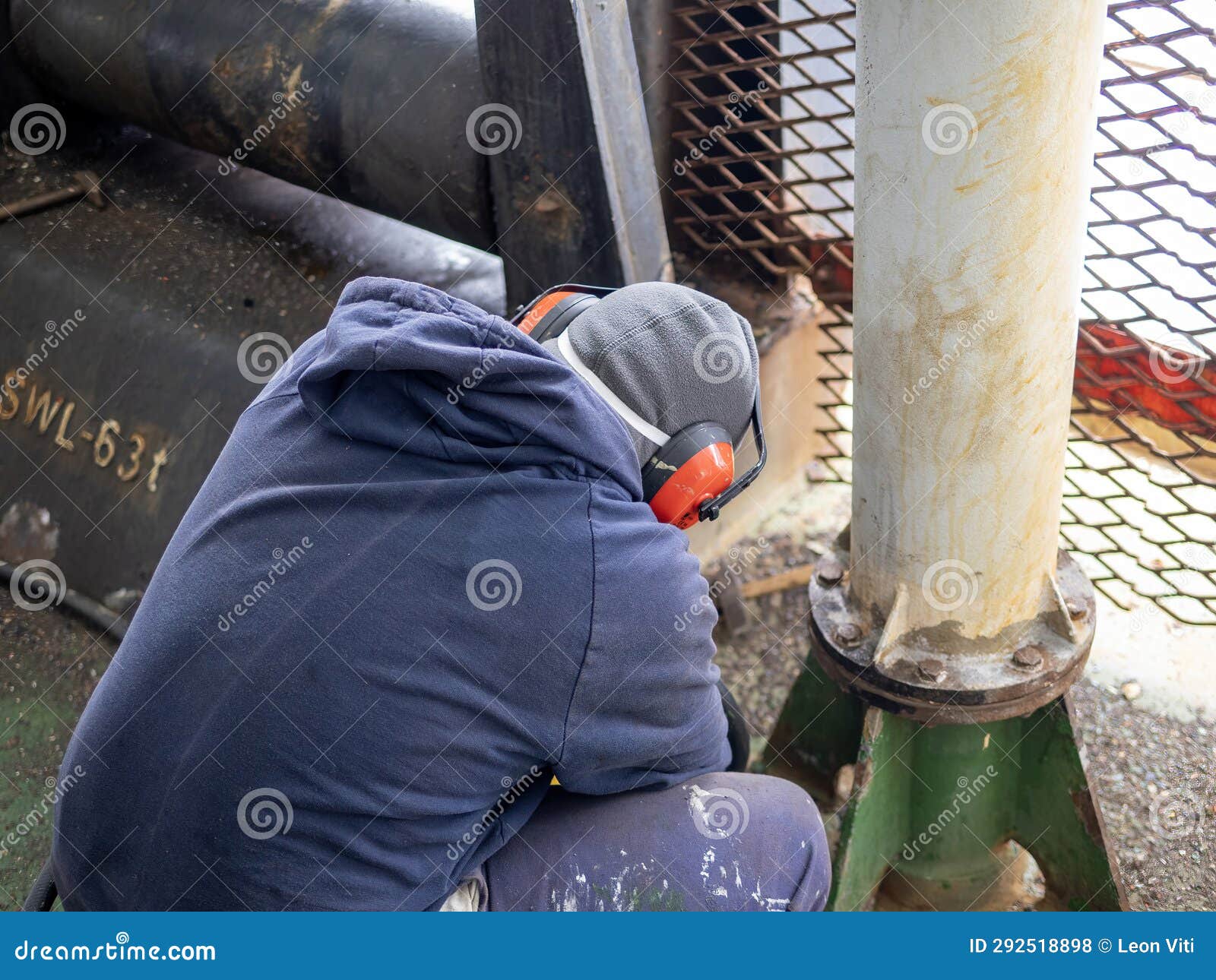 A Ship Crew is Working or Chipping during Maintenance Period on a Cargo ...