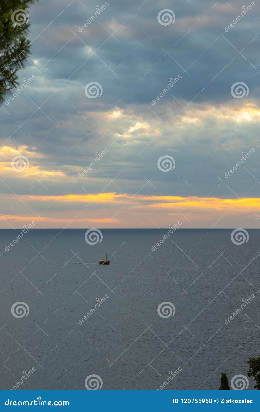 Ship in the Distance at Sunset Stock Photo - Image of shipping, dusk ...