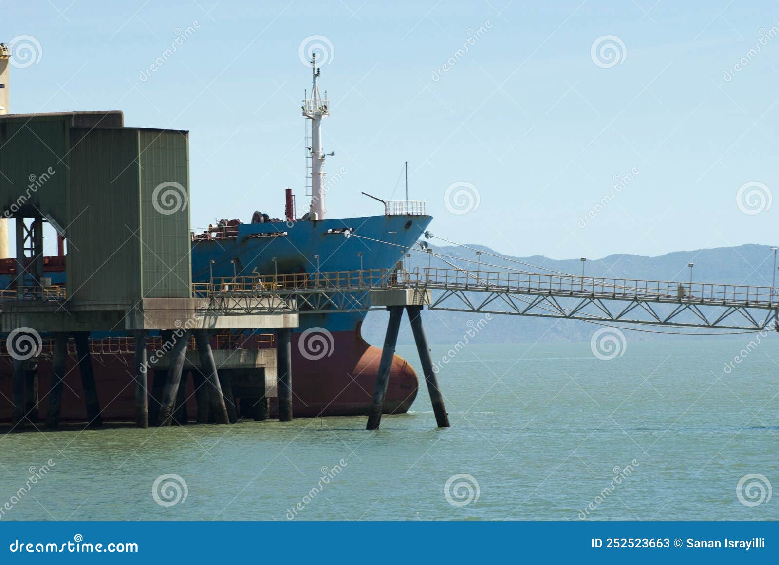 Ship docked at a wharf stock image. Image of cargo, boat - 252523663