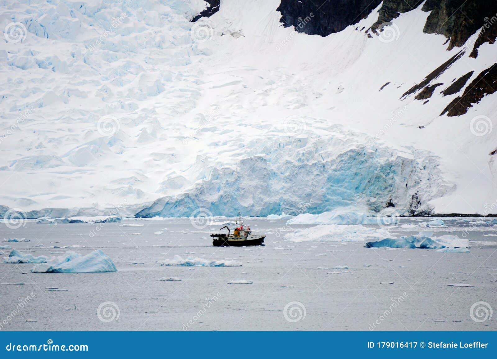 Ship in Front of Glacier in Antarctica Stock Image - Image of cloudy ...