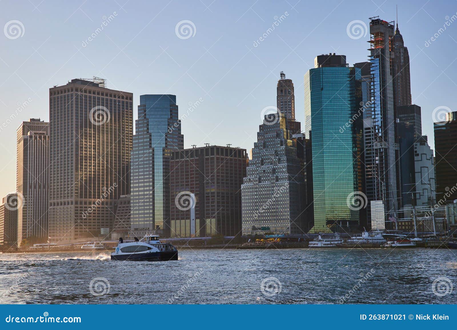 Ship Going Down River in New York City with Skyline in Background ...
