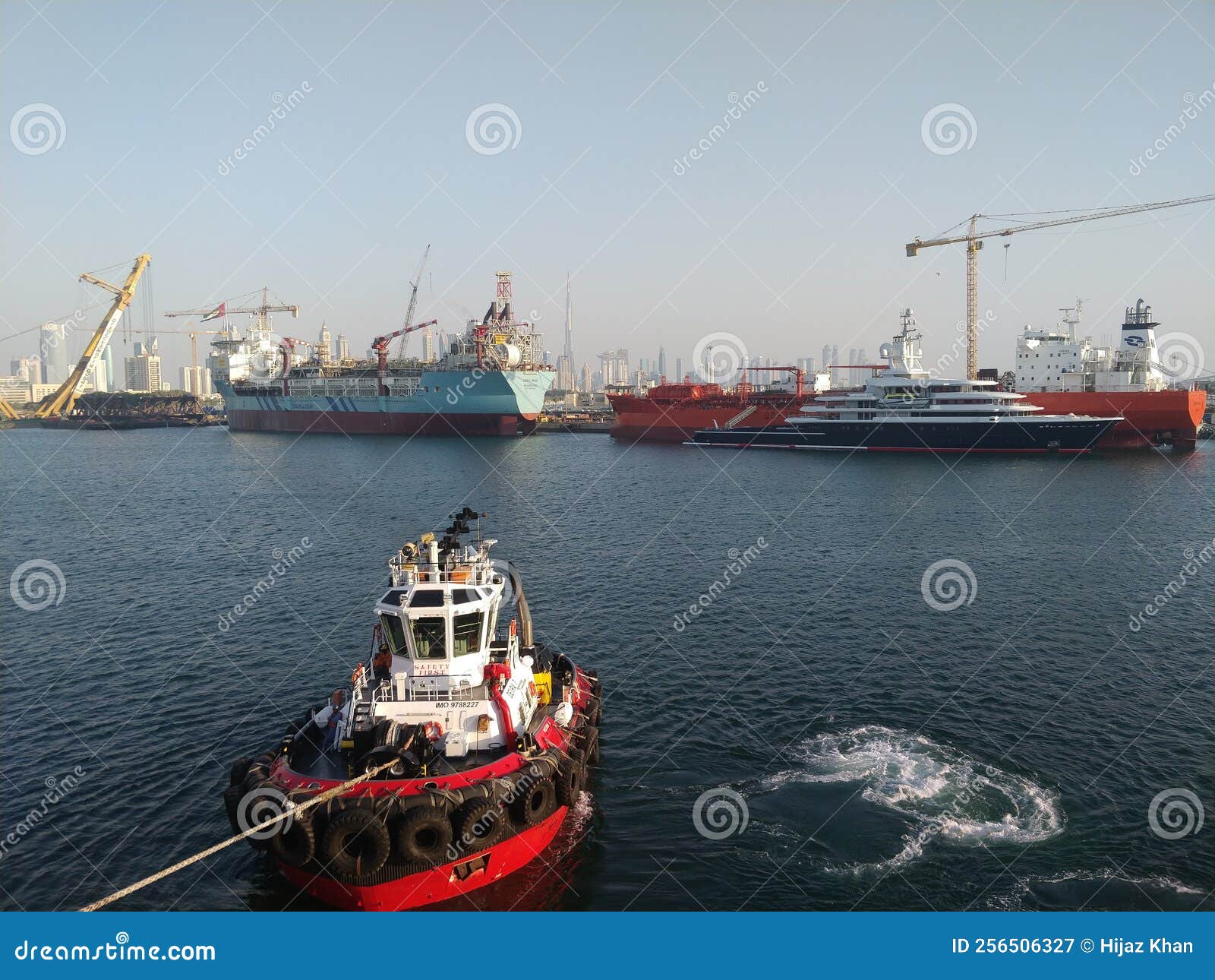 Ship Handling Tug Pulling Out Shop from Dock Editorial Photography ...