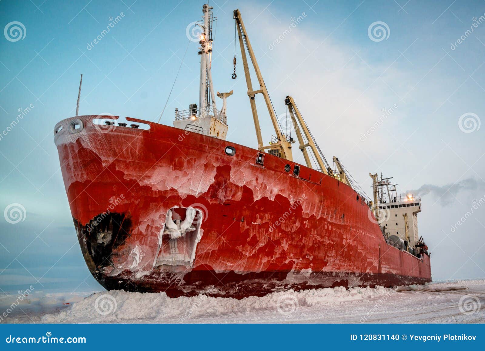 Ship in ice on unloading. stock photo. Image of unloading - 120831140