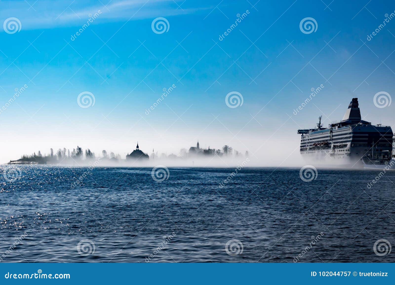 Ship and island in fog stock image. Image of ship, foggy - 102044757