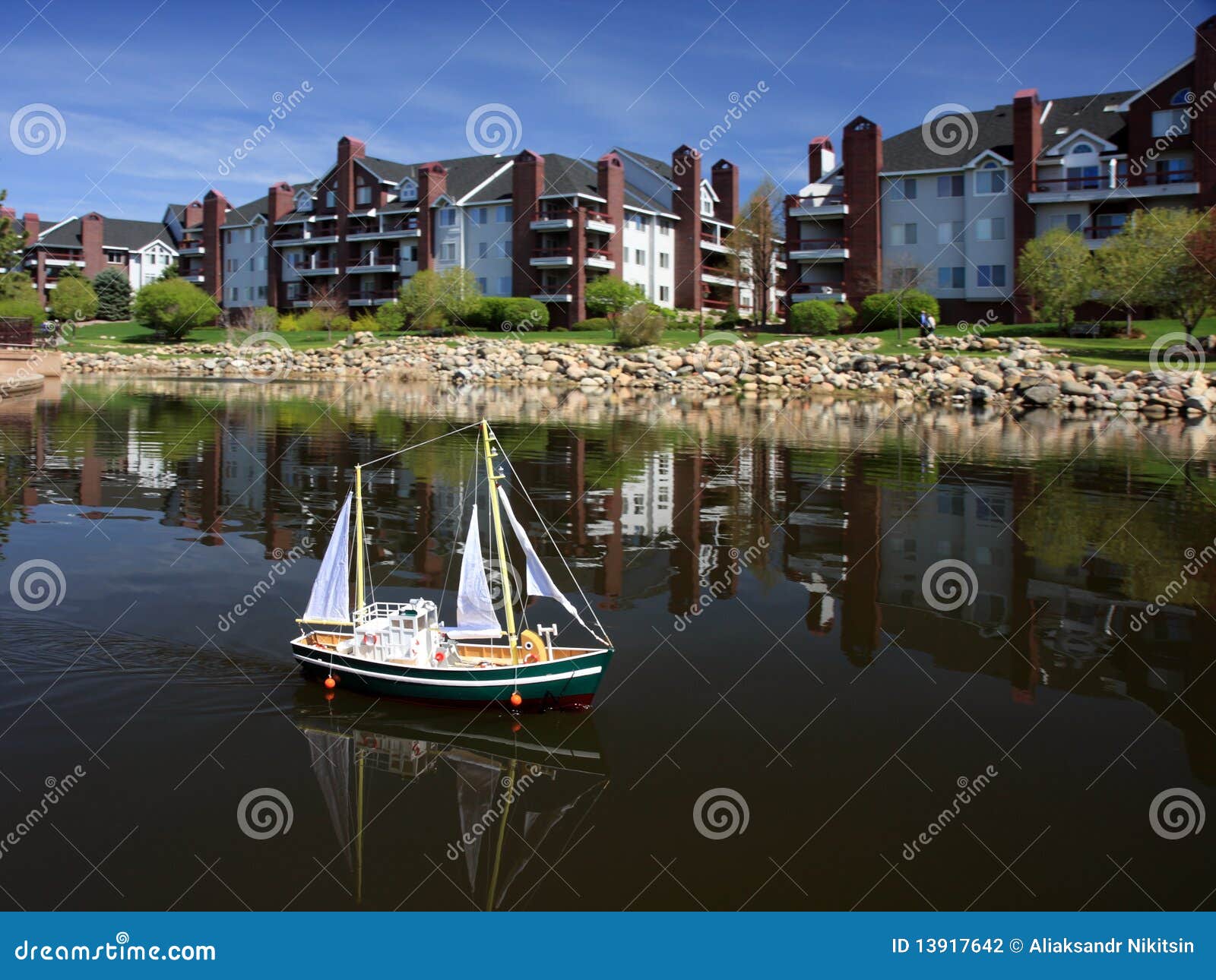 Ship Model with Sails on the Water Stock Photo - Image of apartment ...