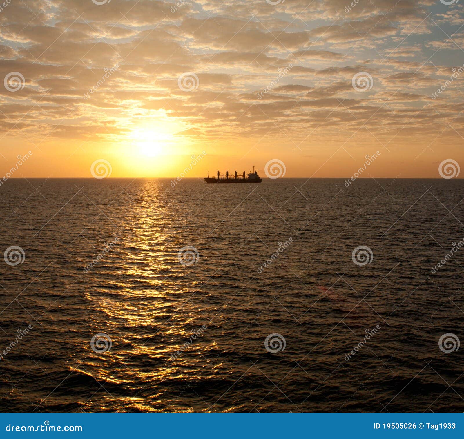 Ship on ocean at sunset stock photo. Image of marine - 19505026