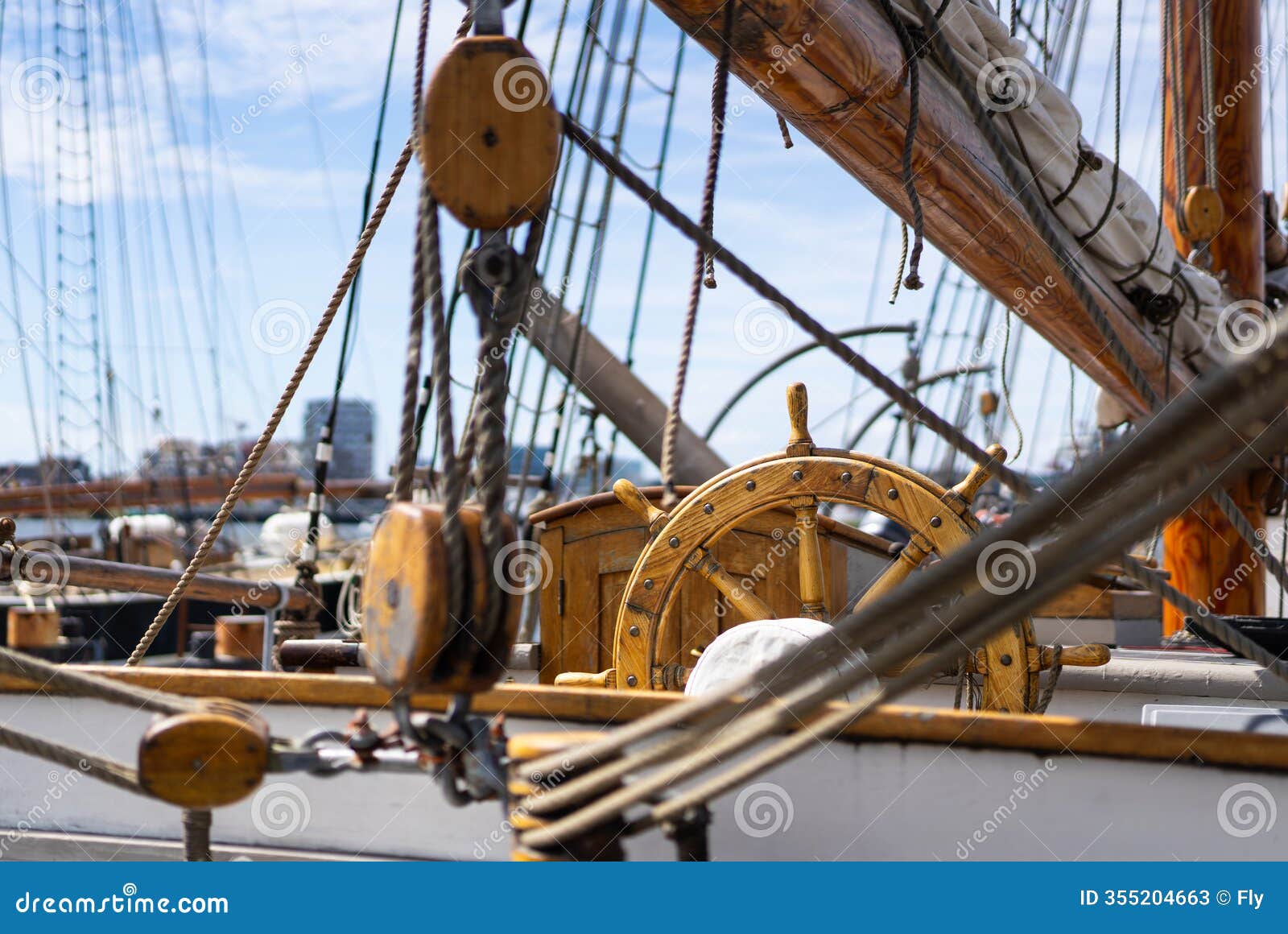 Ship Rigging and Wheel in Nautical Setting Stock Image - Image of ...