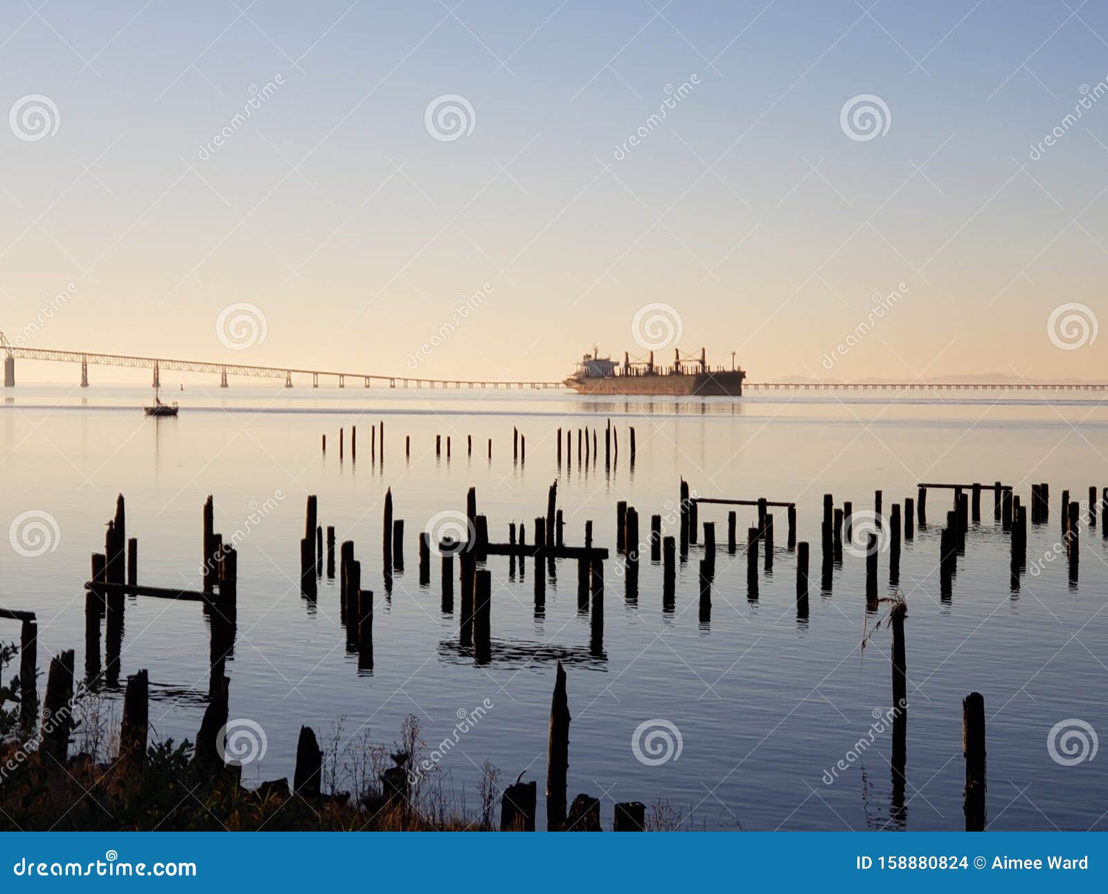 Ship on the river stock photo. Image of pilings, calm - 158880824