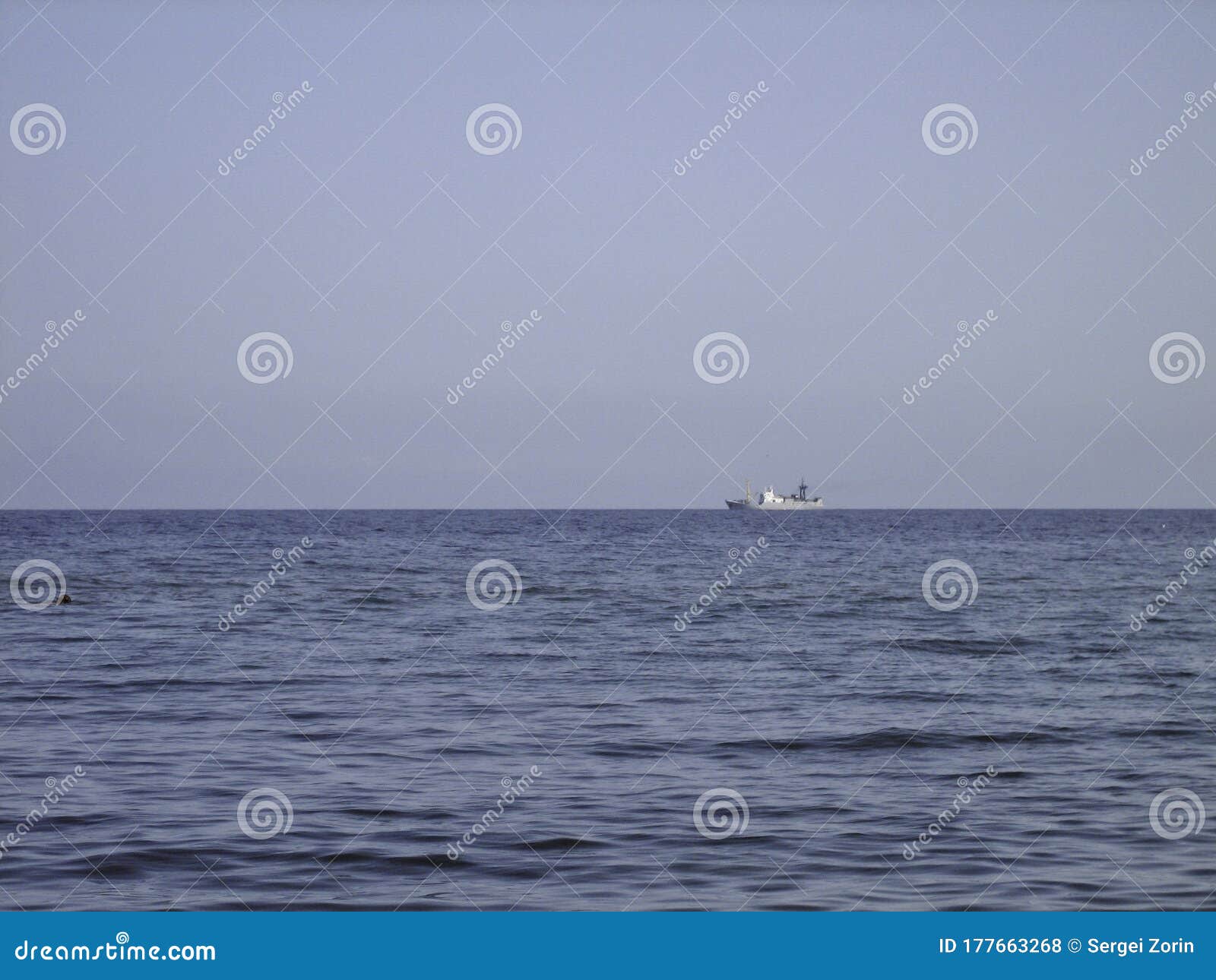 A Ship on the Roadstead on the Horizon between the Sky and the Sea ...