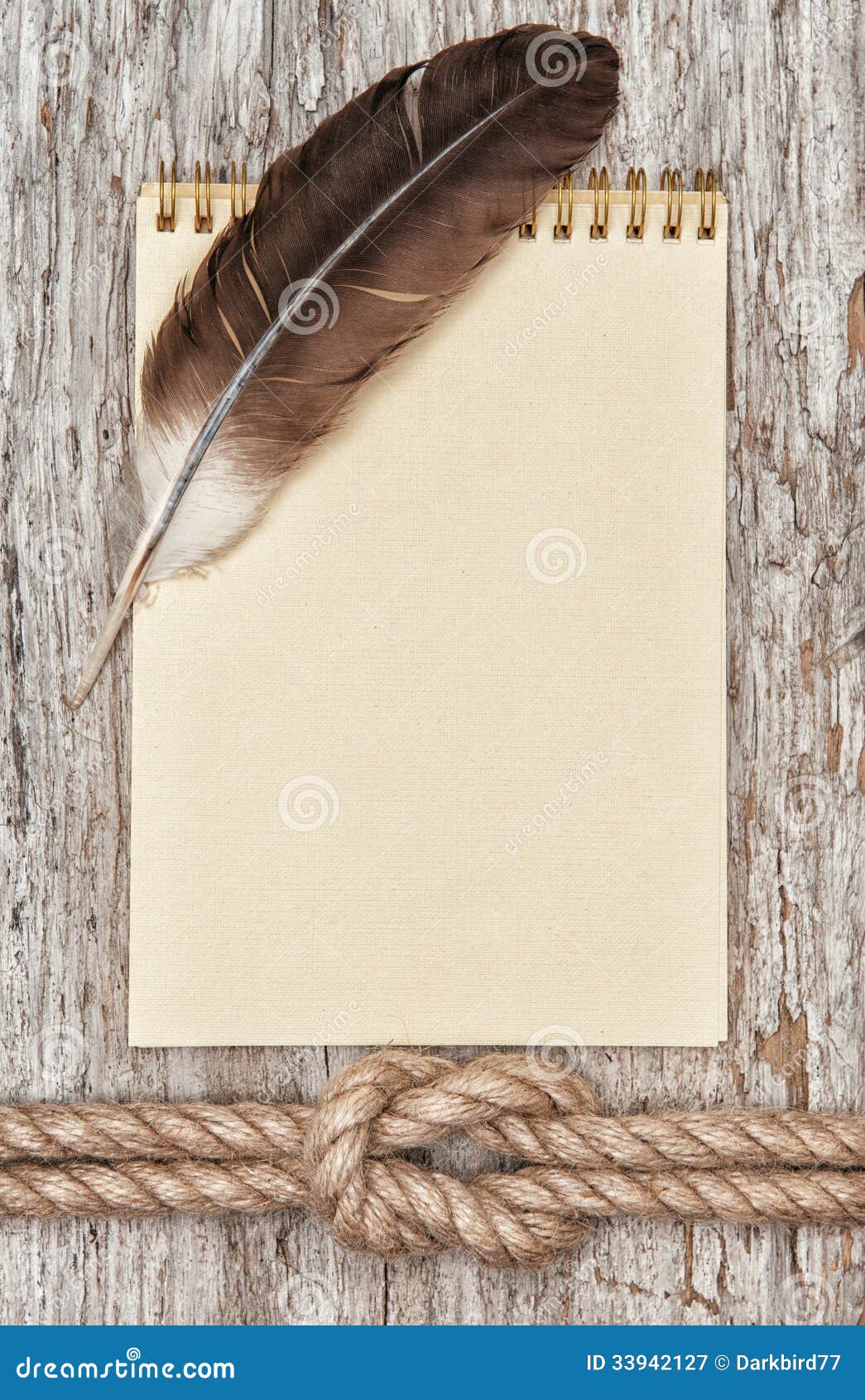 Ship Rope, Feather, Spiral Notebook and Wood Background Stock Image ...