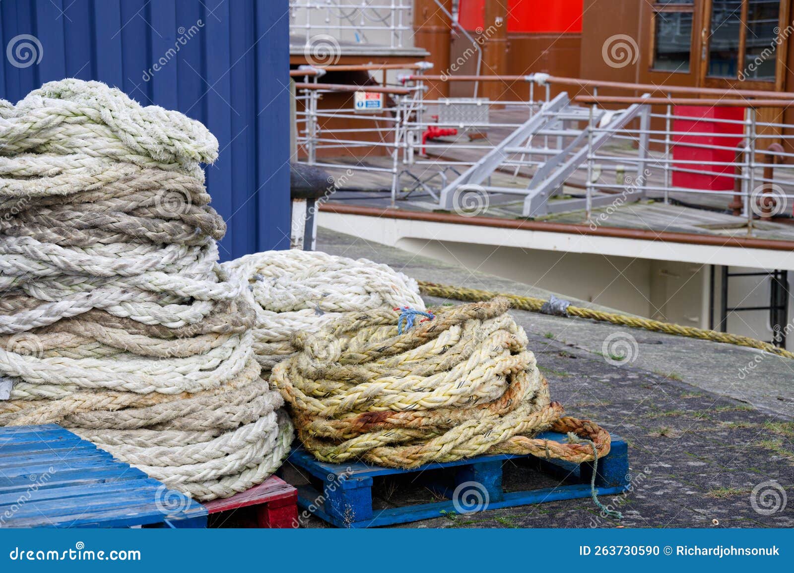 Ship Rope in Roll at Harbour for Secure Mooring of Boat Stock Photo ...