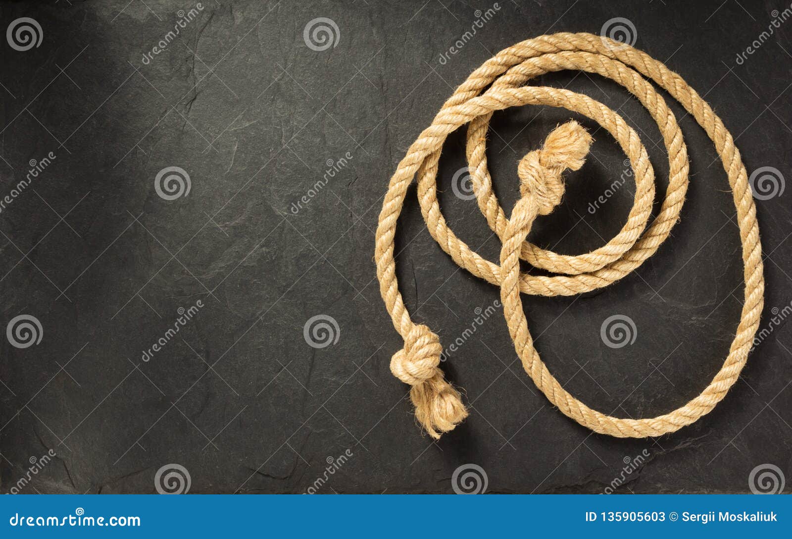 Ship rope on slate stone stock image. Image of decoration - 135905603