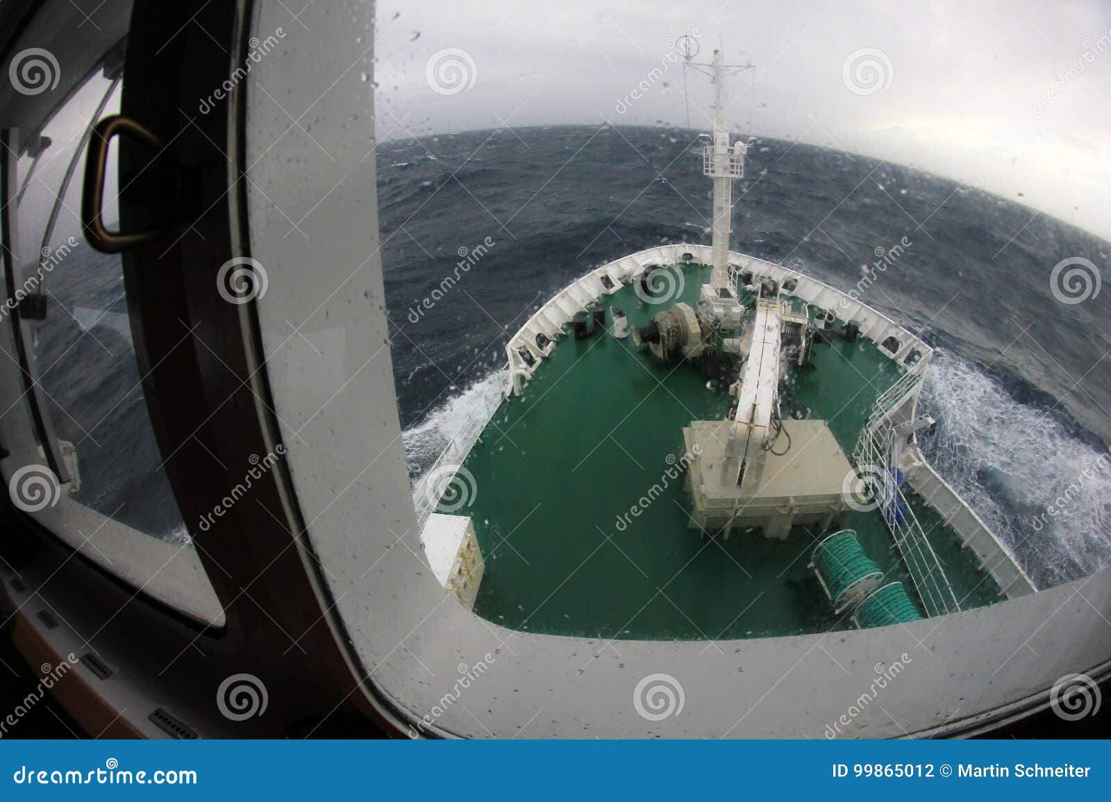 Ship`s Bow Diving into a Big Splashing Wave, Antarctica Stock Photo ...