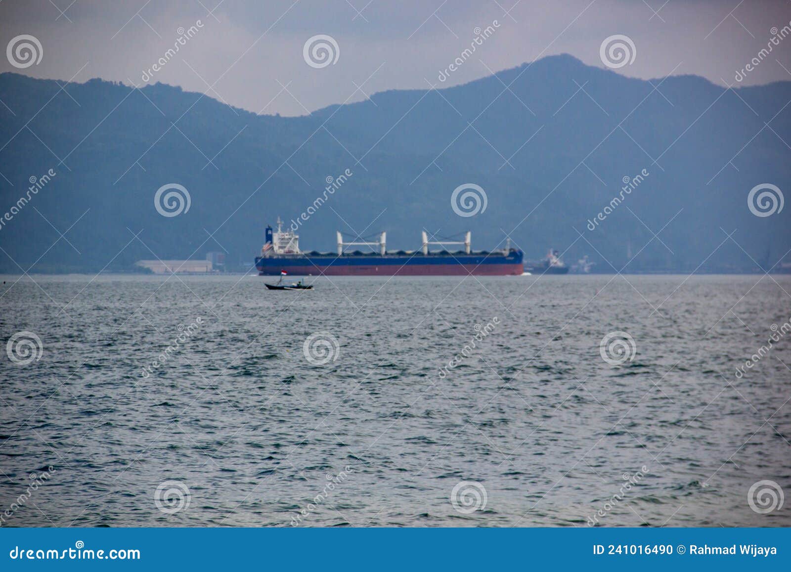 A Ship Sailing in the Middle of the Sea Stock Photo - Image of shore ...