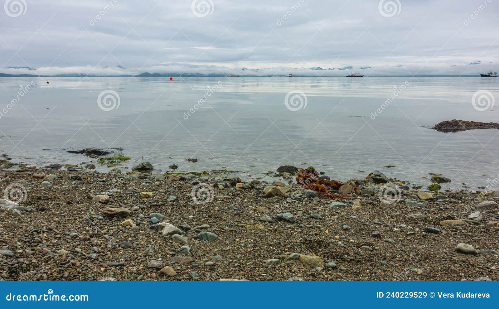 A Ship is Sailing on the Smooth, Calm Surface of the Pacific Ocean ...