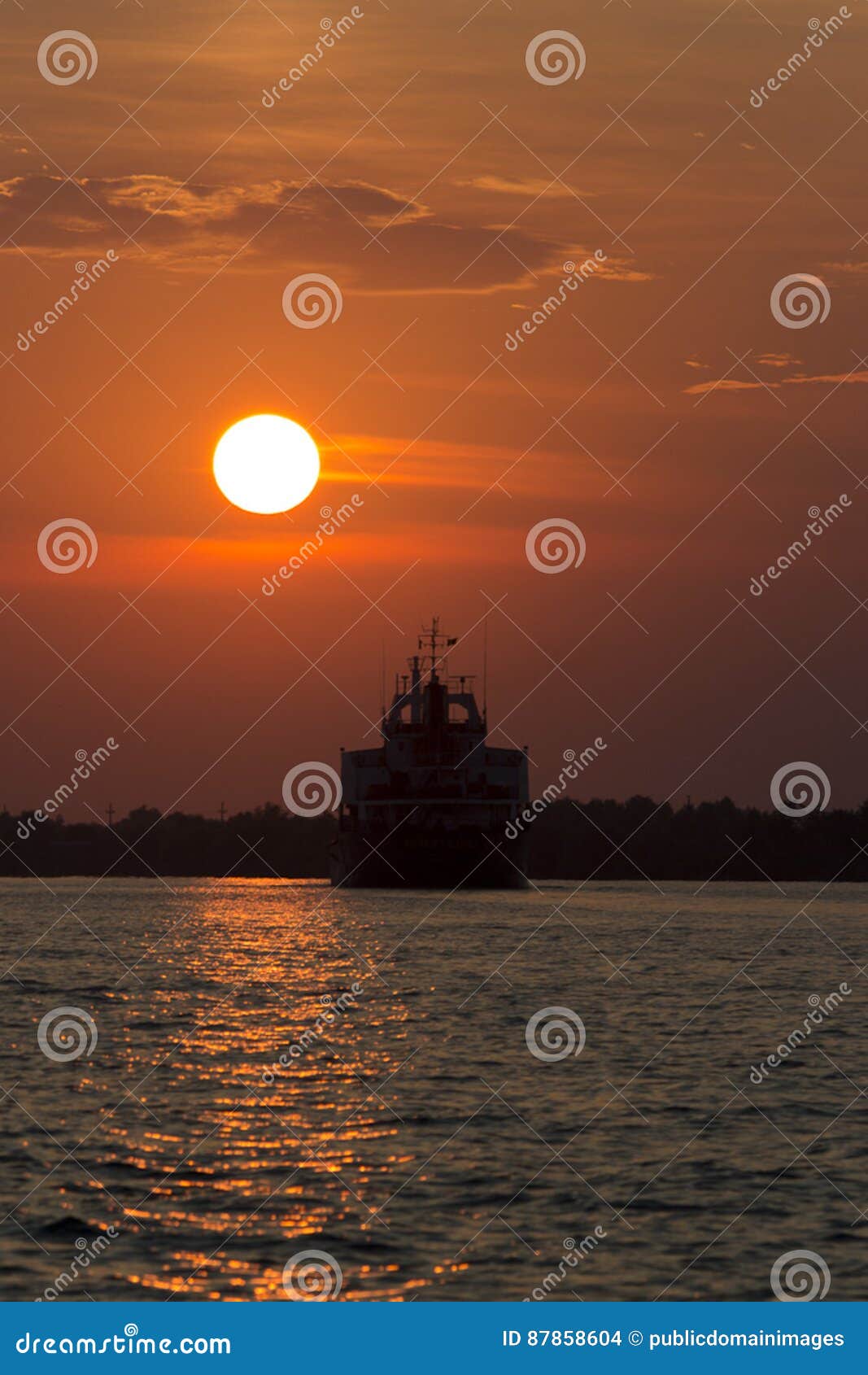 Ship Sailing Into Sunset Picture. Image: 87858604