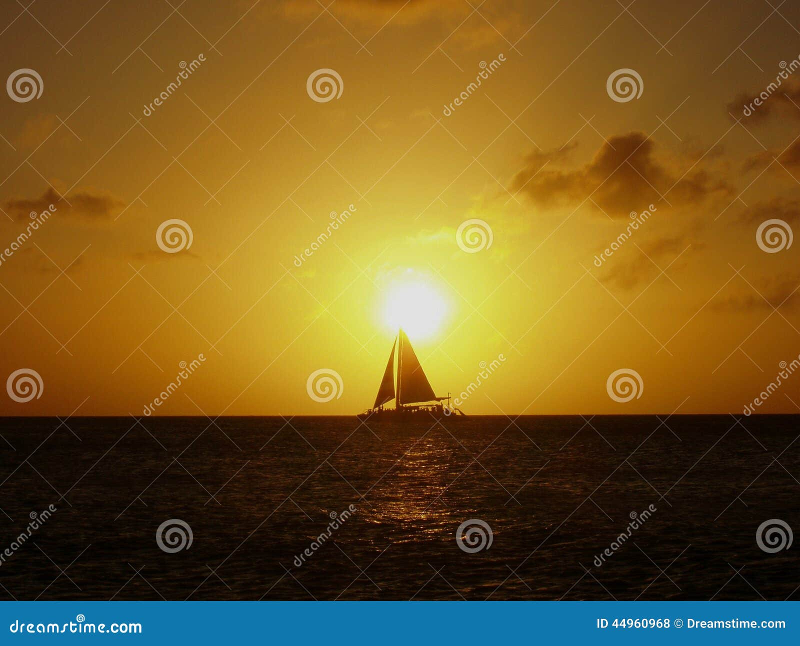 Ship sailing during sunset stock photo. Image of sail - 44960968