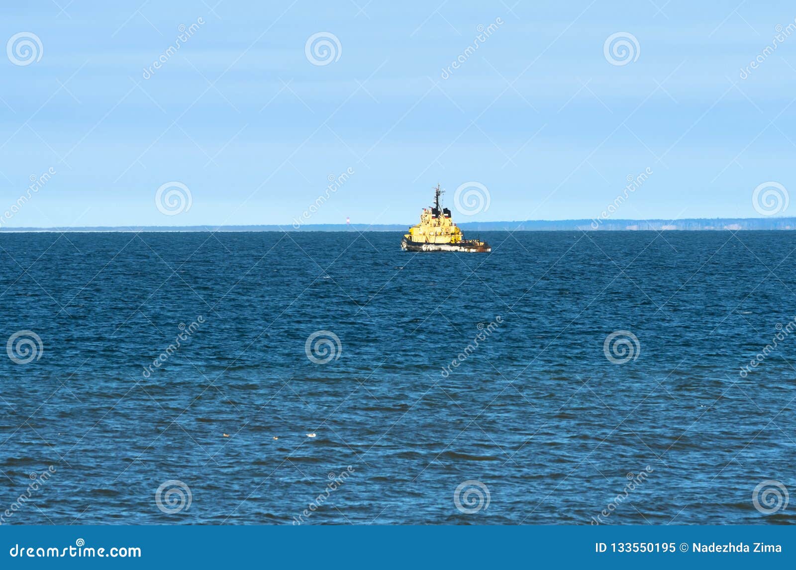 A ship at sea far away stock image. Image of ship, light - 133550195