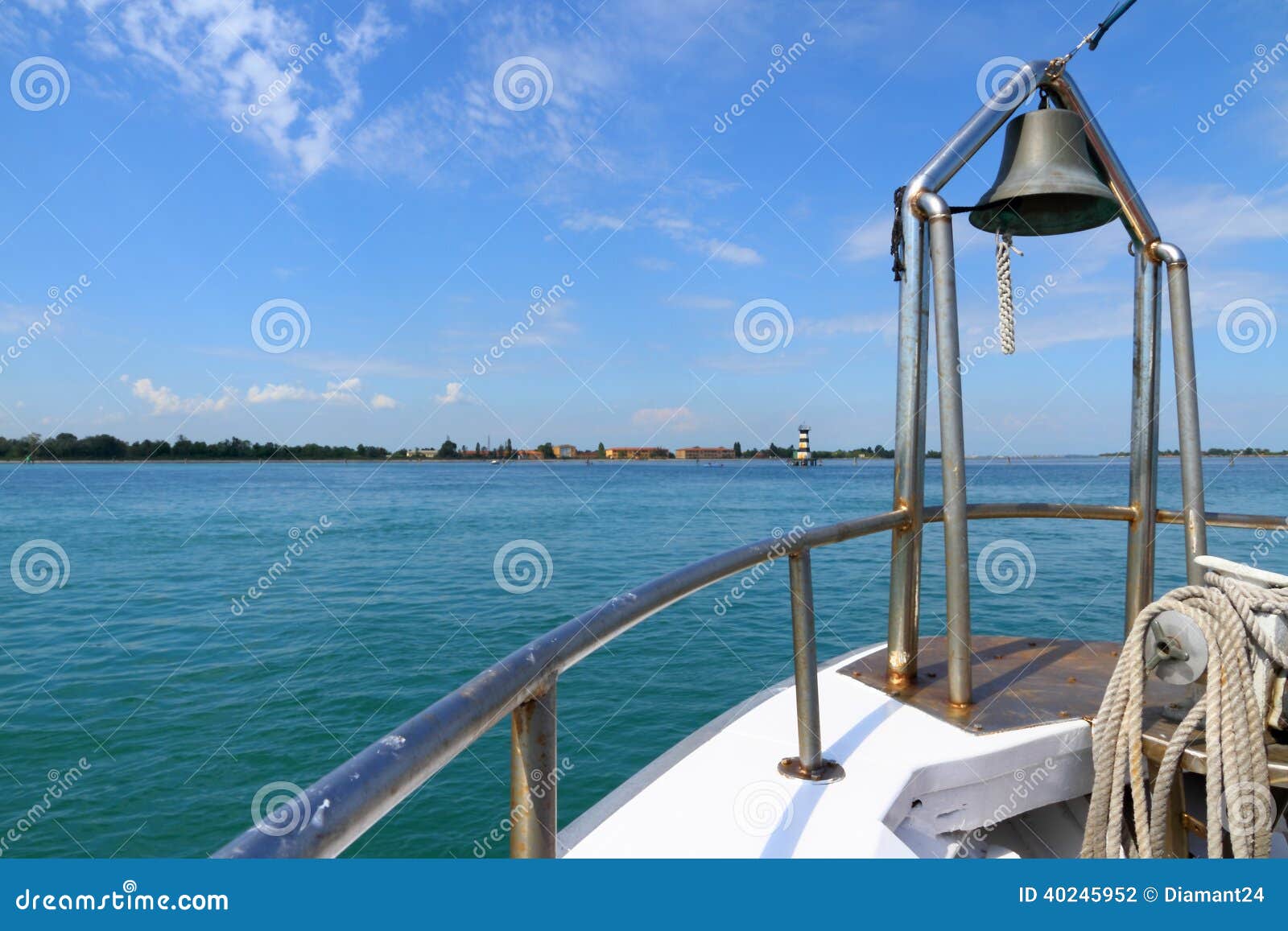 Ship at Sea with View of Lighthouse Deck and Bell Stock Photo - Image ...