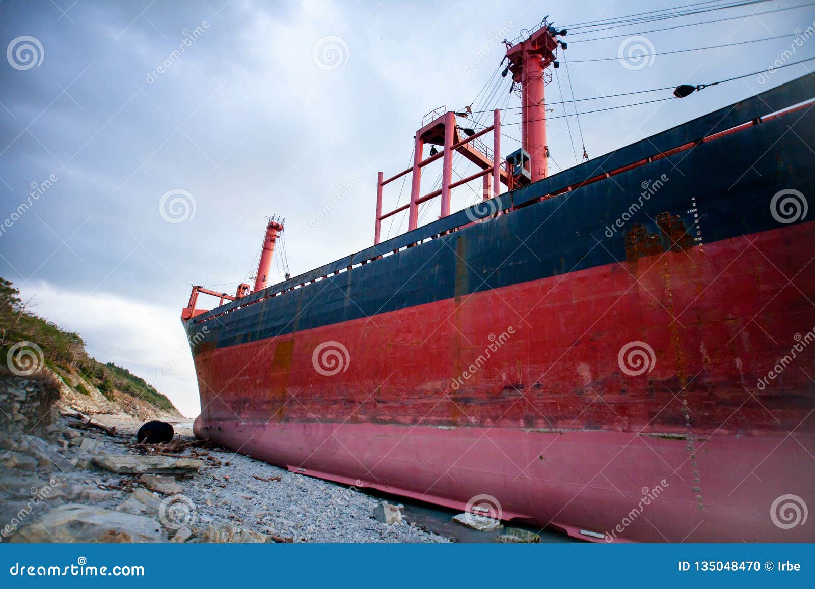 Ship is at the shore stock photo. Image of gale, incident - 135048470